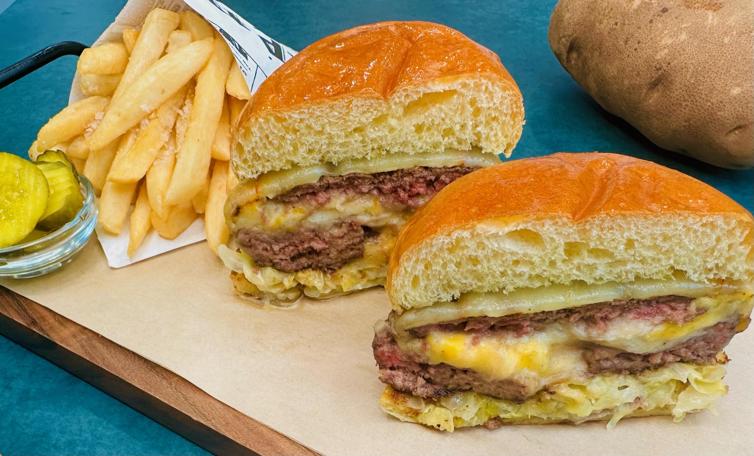 Cheesy Potato Stuffed Burger with Cream Braised Cabbage - Potato Goodness