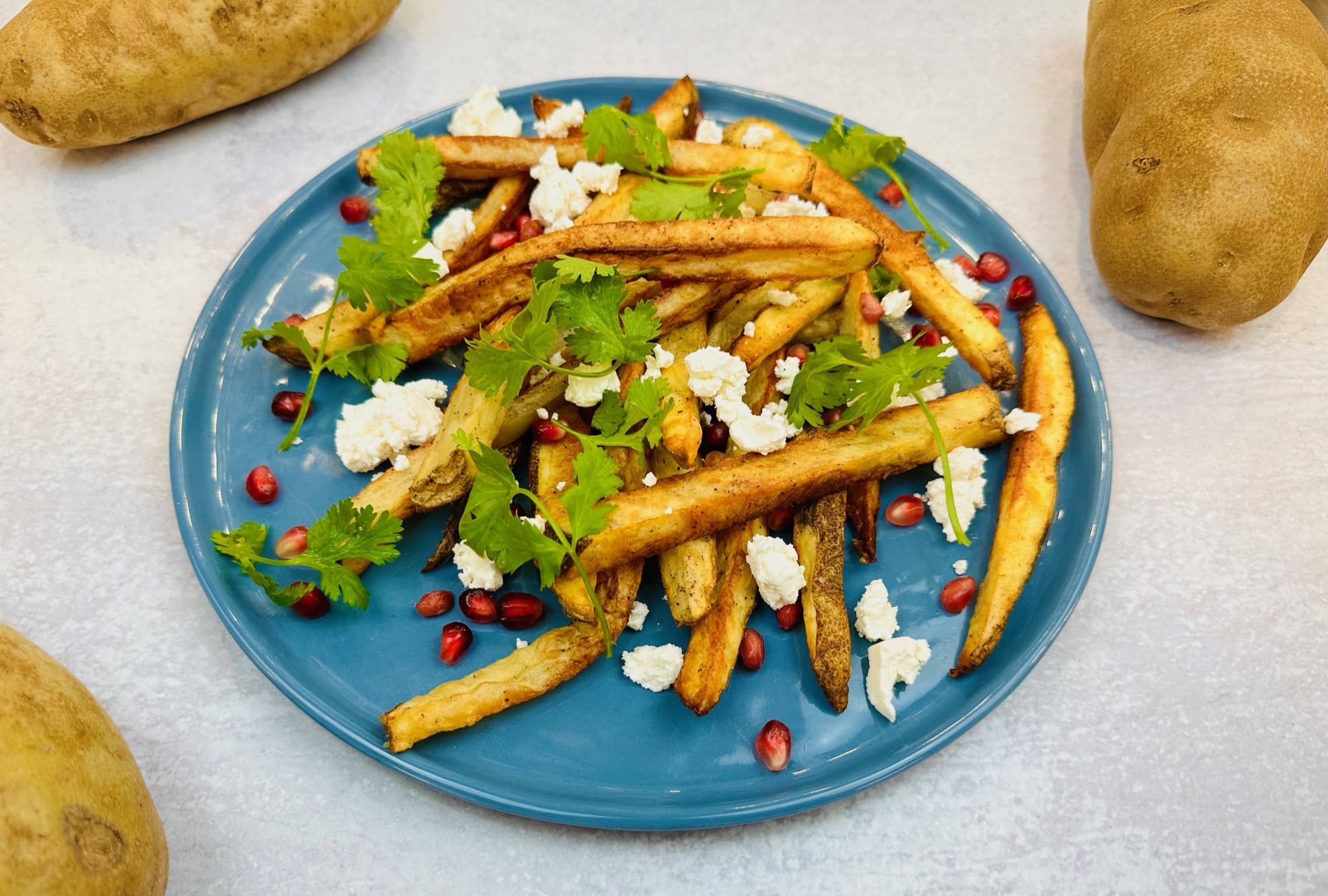 Festive Garlic-Pomegranate Fries - Potato Goodness